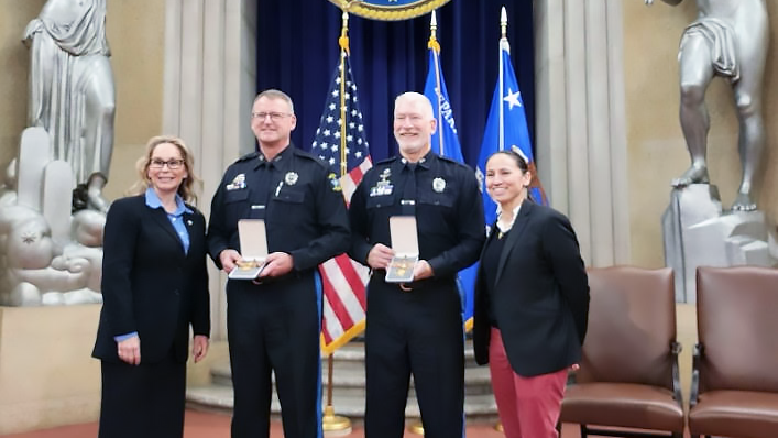 Two Overland Park officers honored for excellence in community policing ...